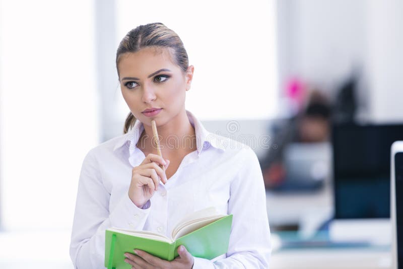 Portrait of Busy Secretary Looking at Camera Stock Image - Image of ...