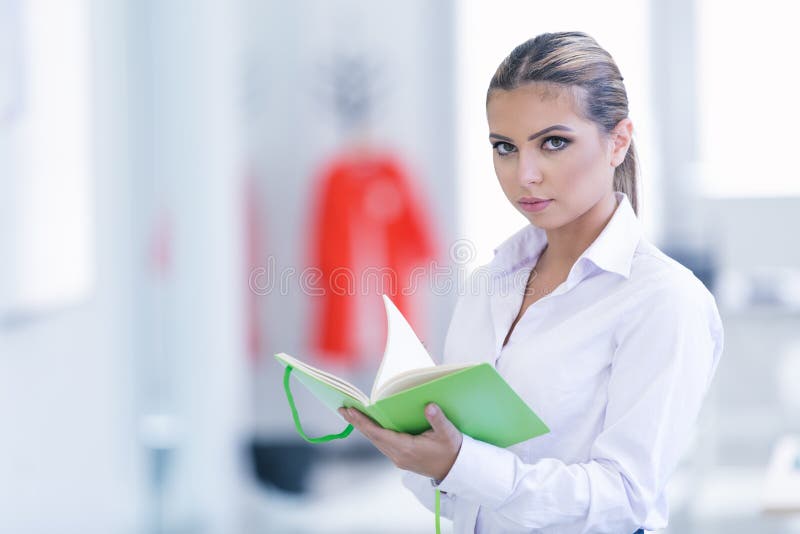 Portrait of Busy Secretary Looking at Camera Stock Image - Image of ...