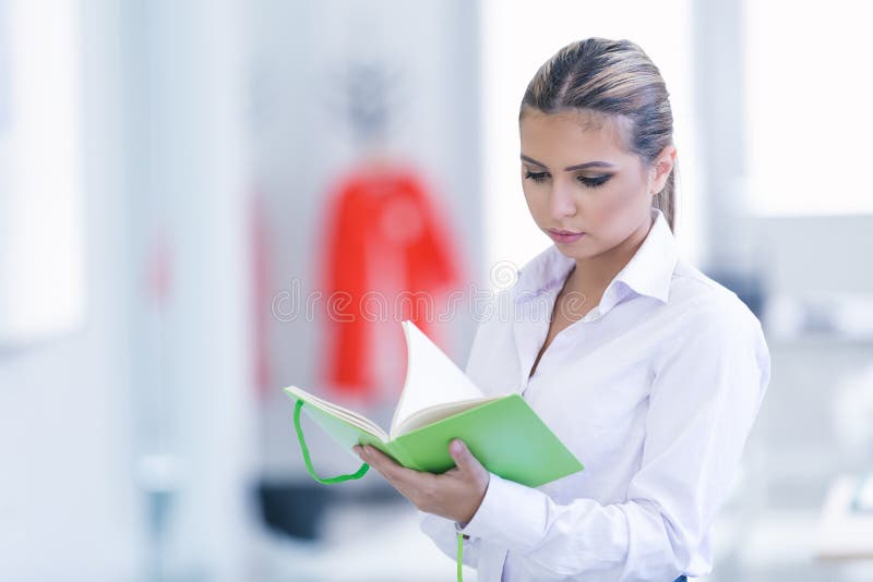Portrait of Busy Secretary Looking at Camera Stock Photo - Image of ...
