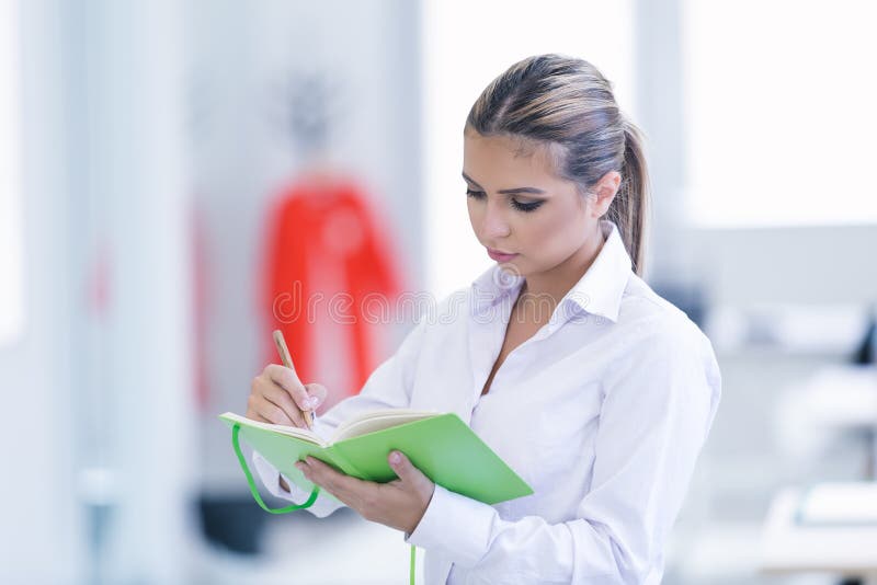 Portrait of Busy Secretary Looking at Camera Stock Image - Image of ...