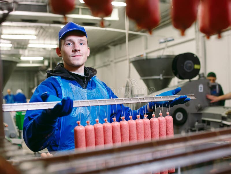 Portrait of Butchers Processing Sausages at Meat Factory Stock Image ...