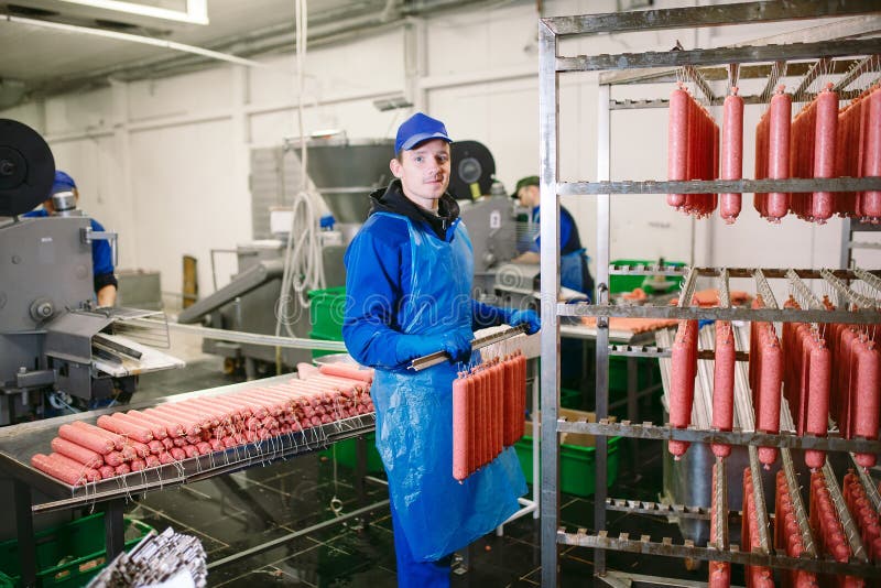Portrait of Butchers Processing Sausages at Meat Factory Stock Image ...