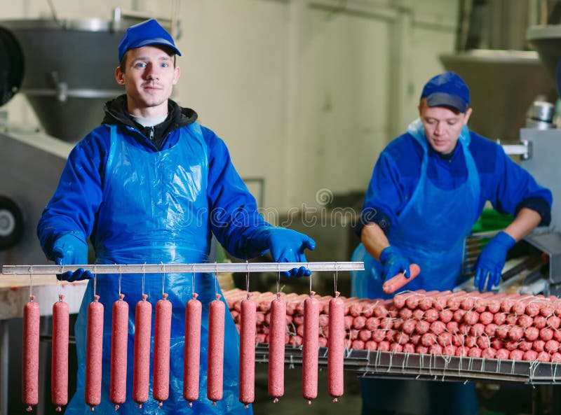 Portrait of Butchers Processing Sausages at Meat Factory Stock Image ...