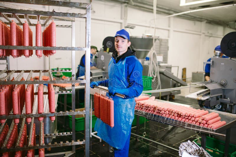 Portrait of Butchers Processing Sausages at Meat Factory Stock Image ...