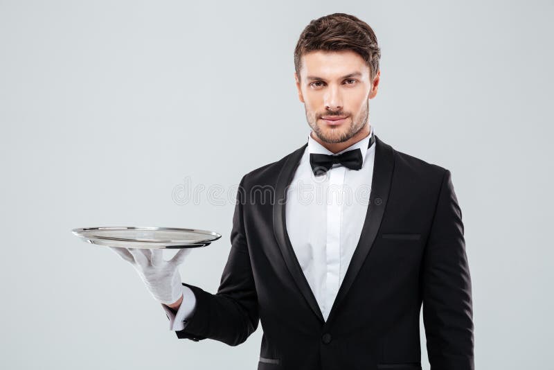 Portrait of Butler in Tuxedo Holding Empty Tray Stock Photo - Image of ...