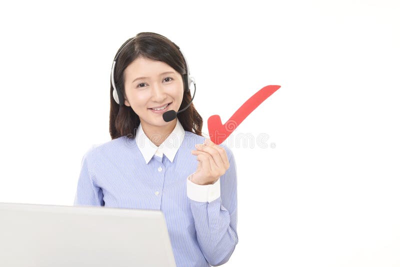 Call Center Operator with a Check Mark Stock Image - Image of headset ...