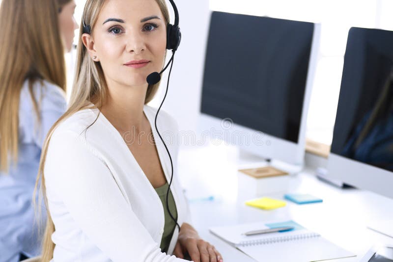 Portrait of Call Center Operator at Work. Group of People in a Headset ...
