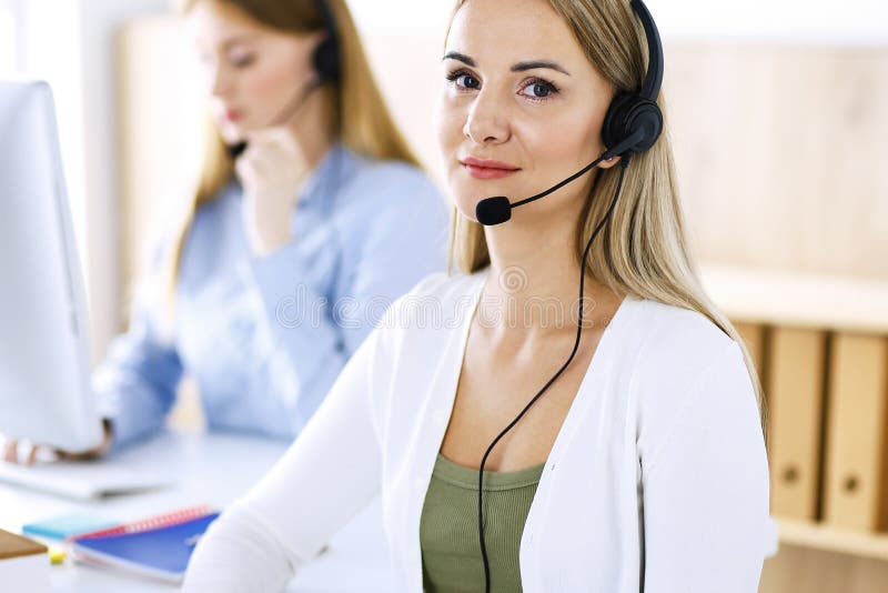 Portrait of Call Center Operator at Work. Group of People in a Headset ...