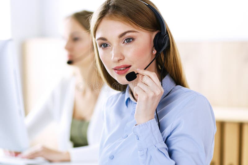 Portrait of Call Center Operator at Work. Group of People in a Headset ...