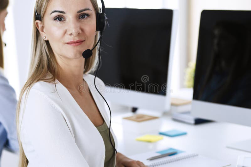 Portrait of Call Center Operator at Work. Group of People in a Headset ...