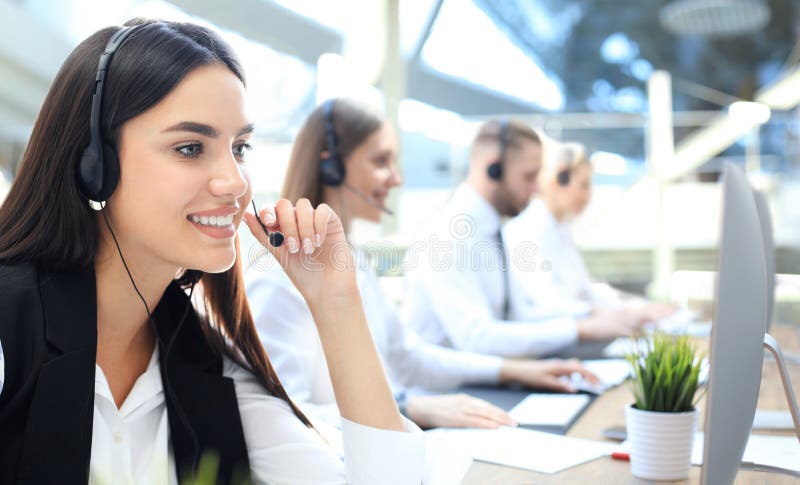 Portrait of Call Center Worker Accompanied by Her Team. Smiling ...