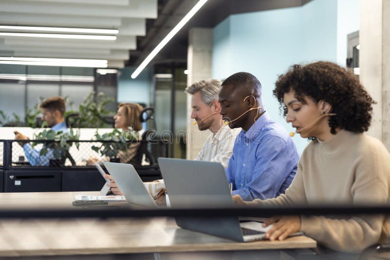 Portrait of Call Center Worker Accompanied by Her Team. Smiling ...