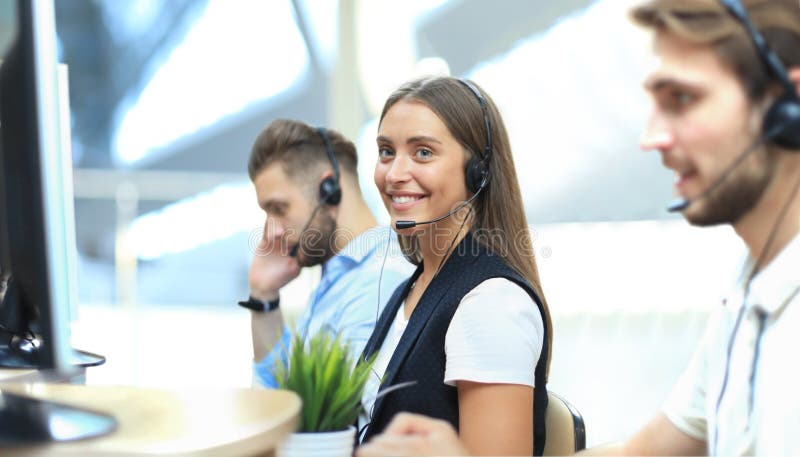 Portrait of Call Center Worker Accompanied by His Team. Smiling ...
