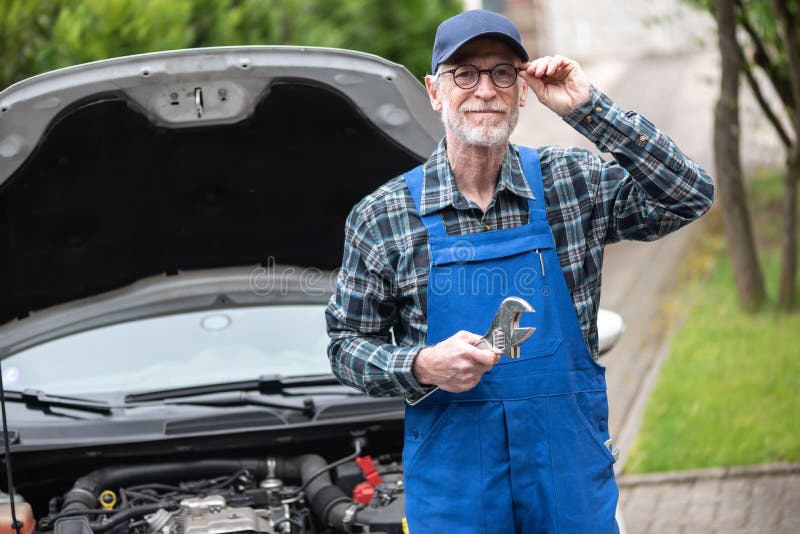 Portrait of car mechanic stock image. Image of person - 176993393