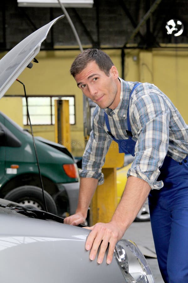 Portrait of car repairer stock image. Image of garage - 16577883