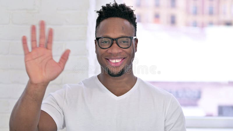 Portrait of Casual African Man Waving at Camera Stock Image - Image of ...