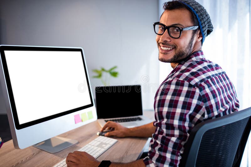 Portrait of Casual Man Working at Computer Desk Stock Photo - Image of ...