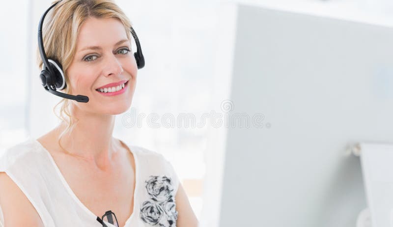 Portrait of a Casual Woman with Headset Using Computer Stock Photo ...