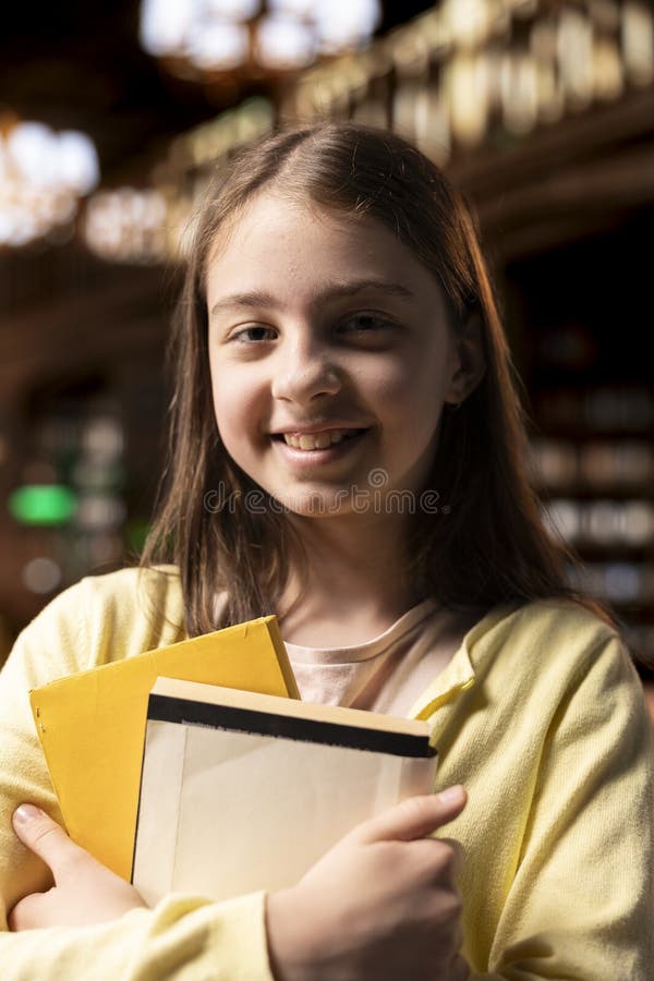 Portrait of Caucasian Student Girl Completing Her Class Notes with ...