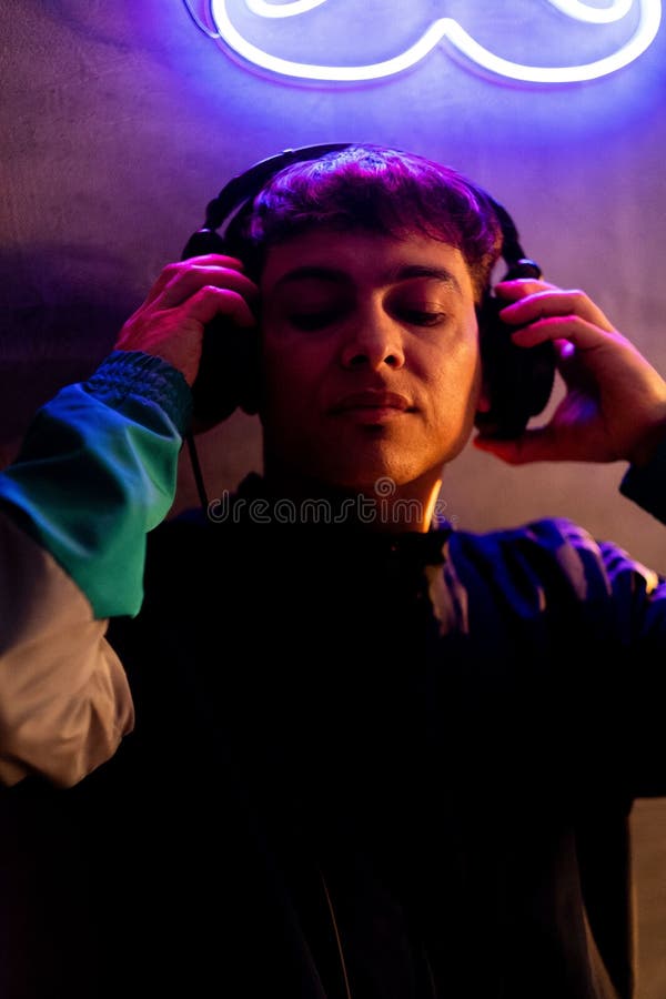 Portrait Of A Caucasian And X28 Whiteand X29 Male Listening To Music With