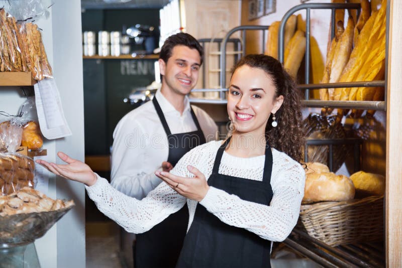 Charming Bakery Staff Sells Bread and Different Pastry for Sale Stock ...