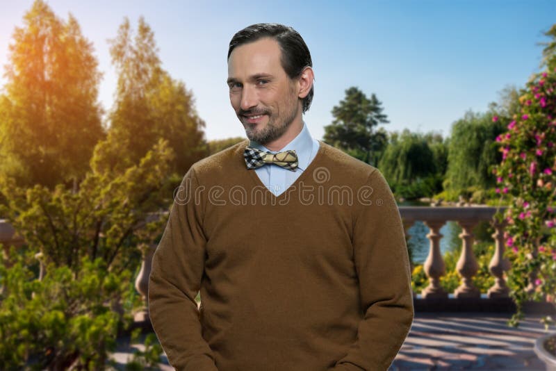 Portrait of Charming Mature Man Standing in the Park. Stock Photo ...