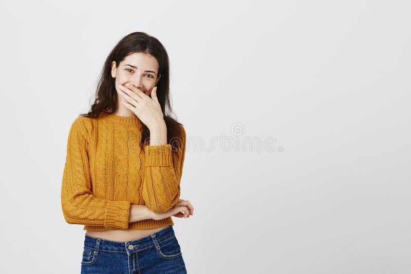 Portrait of Cheerful Charming Caucasian Woman Laughing while Covering ... Portrait of Cheerful Charming Caucasian Woman Laughing while Covering ...