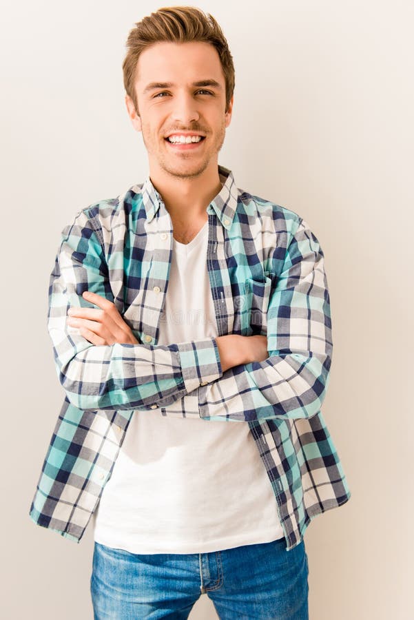 Portrait of Cheerful Happy Man with Beaming Smile and Crossed Hands ... Portrait of Cheerful Happy Man with Beaming Smile and Crossed Hands ...