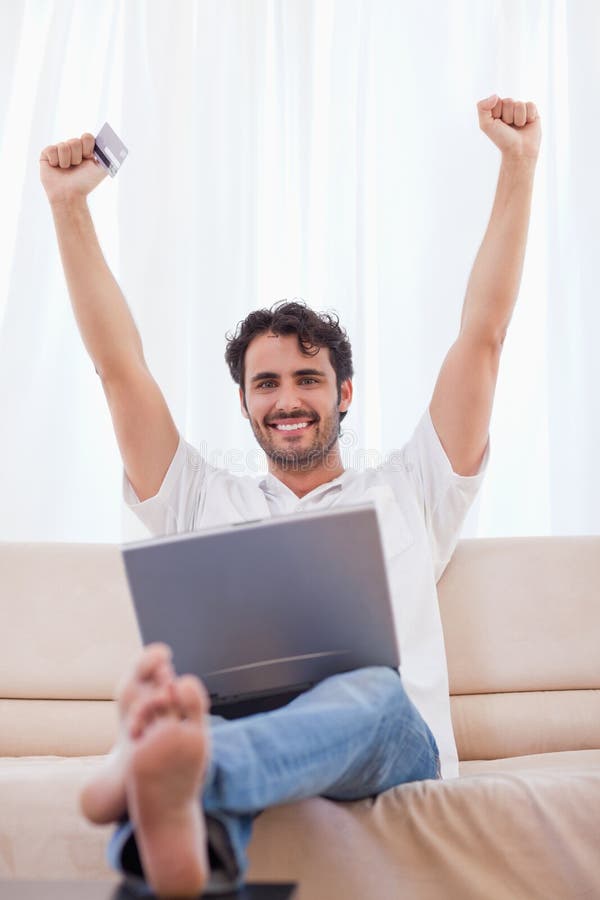 Portrait of a Cheerful Man Buying Online Stock Photo - Image of booking ...