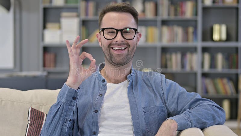 Portrait of Cheerful Man Doing OK Sign in Loft Office Stock Photo ...