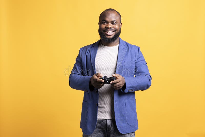 Portrait of Cheerful Man Playing Videogames with Controller, Studio ...
