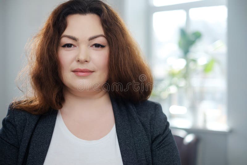 Portrait of a Cheerful Plus Size Model Stock Photo - Image of body ...