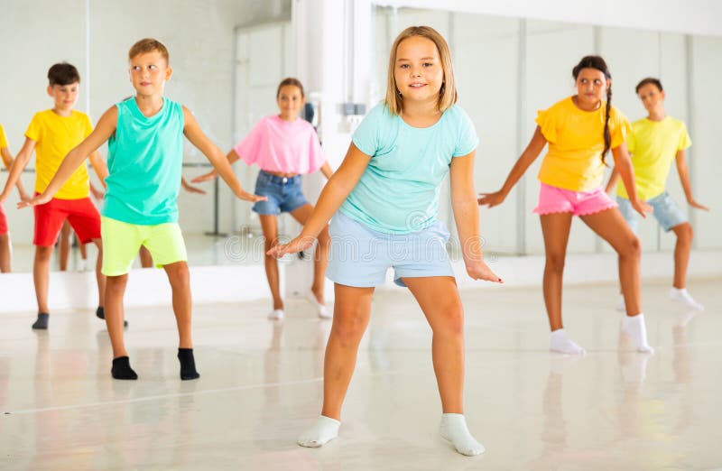 Cheerful Preteen Girl Learning Charleston in Choreographic Studio Stock ... Cheerful Preteen Girl Learning Charleston in Choreographic Studio Stock ...
