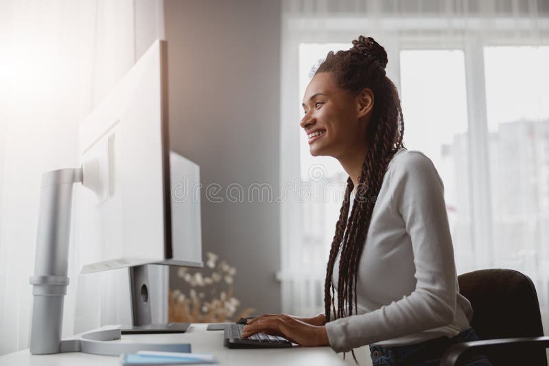 Portrait of Cheerful Smiled Young Woman Coder Working from Home ...