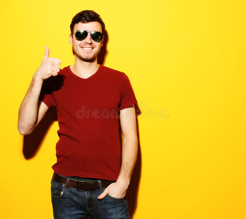 Portrait of a Cheerful Young Man Showing Okay Stock Photo - Image of ...