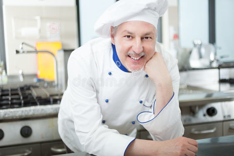 Portrait of a Chef in His Kitchen Stock Photo - Image of senior ...