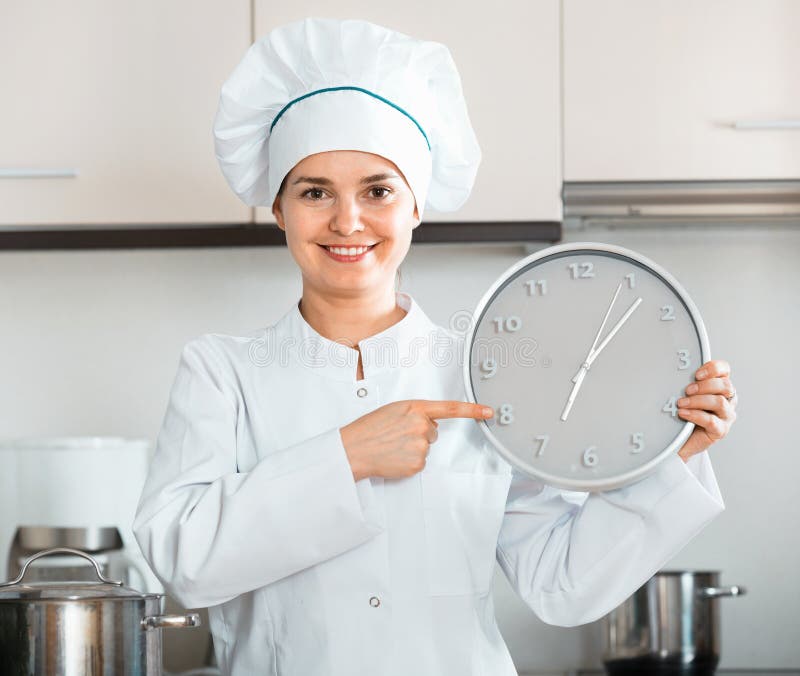Portrait of Chef Holding Big Clock Stock Image - Image of holding ...