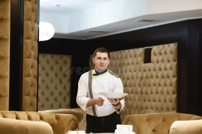 Portrait Chef Presenting a Dish at the Hotel Restaurant, Presentation ...