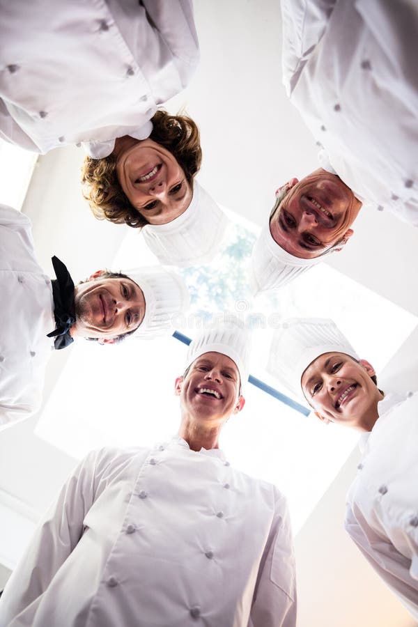 Portrait of Chefs Team Finishing Dessert Plates Stock Image - Image of ...