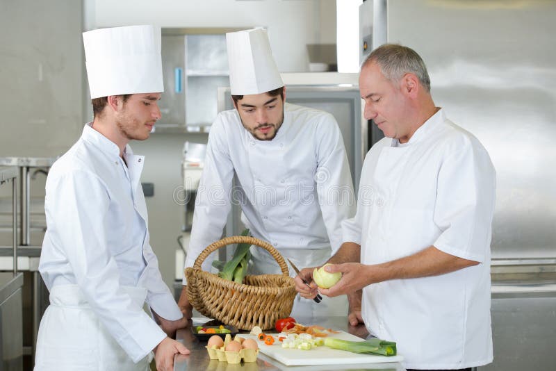 Portrait chefs at work stock image. Image of recipe - 266081801