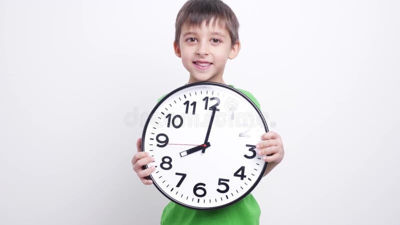 Portrait of a Child Boy Schoolboy Laughs Holding a Round Large Clock on ...