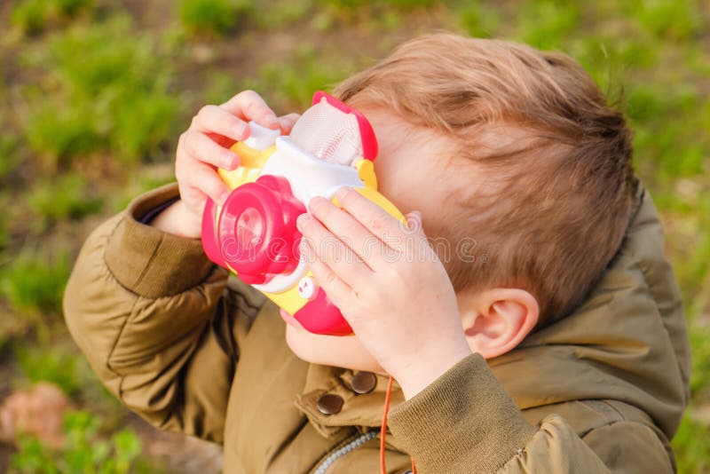 Portrait of Child Boy Taking Outdoors Photo, Camera Toy Stock Image ...