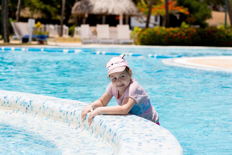 Portrait of a Child Playing in the Pool Stock Photo - Image of healthy ...