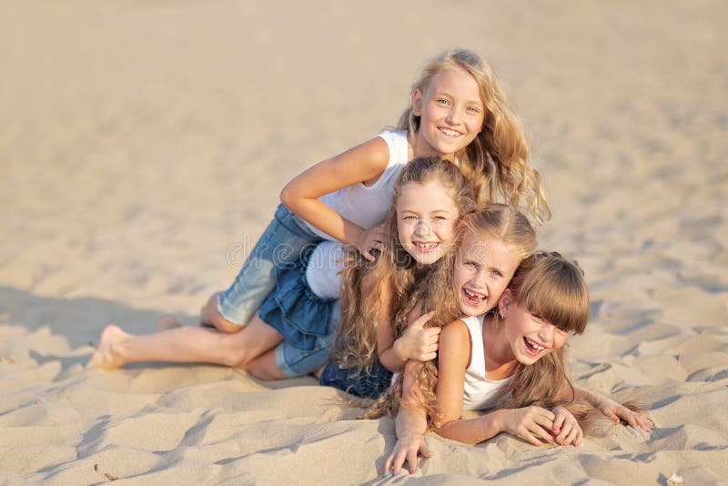 Portrait of Children on the Beach Stock Photo - Image of portrait, rain ...