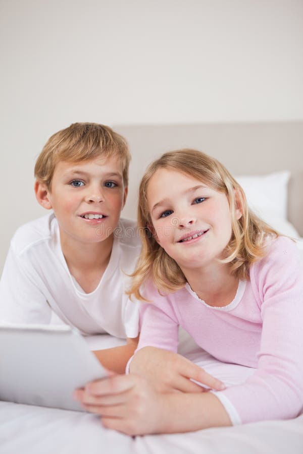 Portrait of Children Using a Tablet Computer Stock Photo - Image of ...