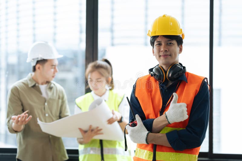 Portrait of a Civil Engineer, Architect Against the Background of a ... Portrait of a Civil Engineer, Architect Against the Background of a ...