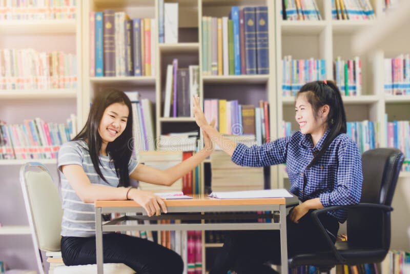 Portrait of Clever Asian Student Reading and Doing Research Stock Image ...