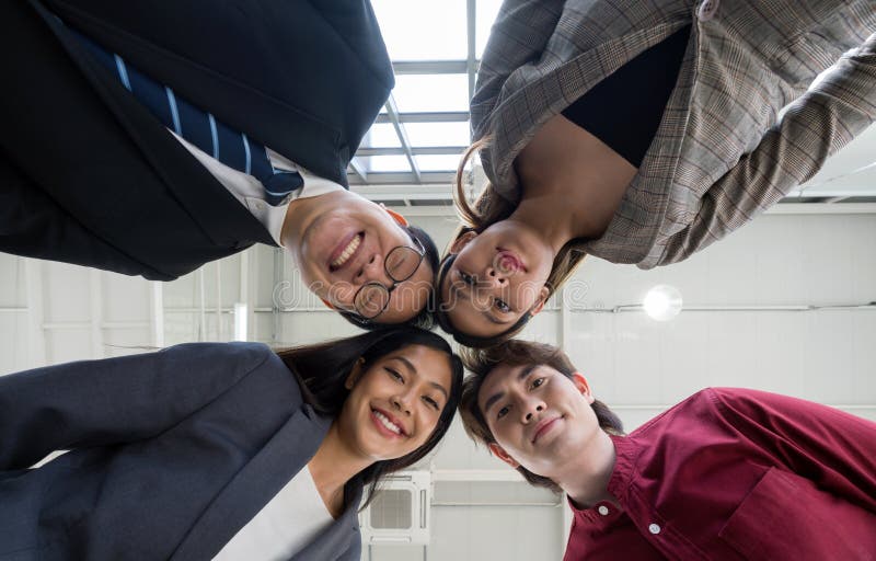 Portrait Closeup Bottom View Happy Faces of Employees Team Standing in ...