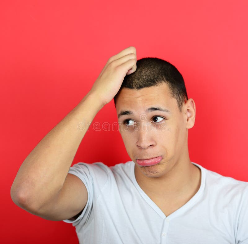 Portrait of Clueless Man Against Red Background Stock Image - Image of ...