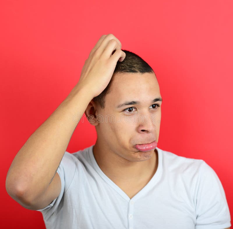 Portrait of Clueless Man Against Red Background Stock Image - Image of ...